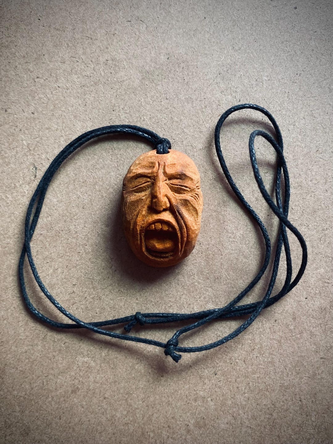 Hand Carved Avocado Stone Necklace Angry Face Screaming Man Face ...