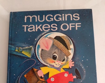 Muggins Takes off by Marjorie Barrows Illustrated by Anne Sellers Leaf ...