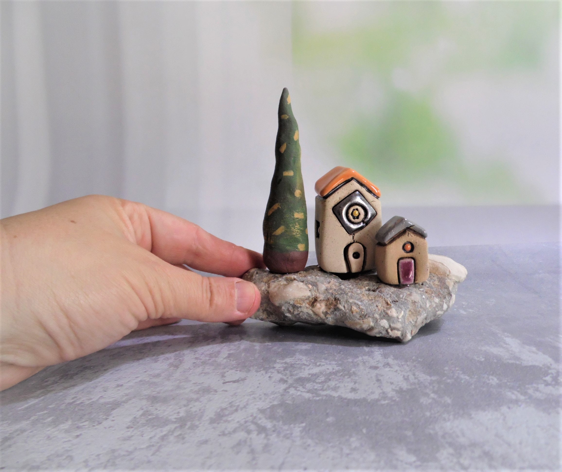 Small Village of Two Ceramic Houses and a Tree on a Natural ...
