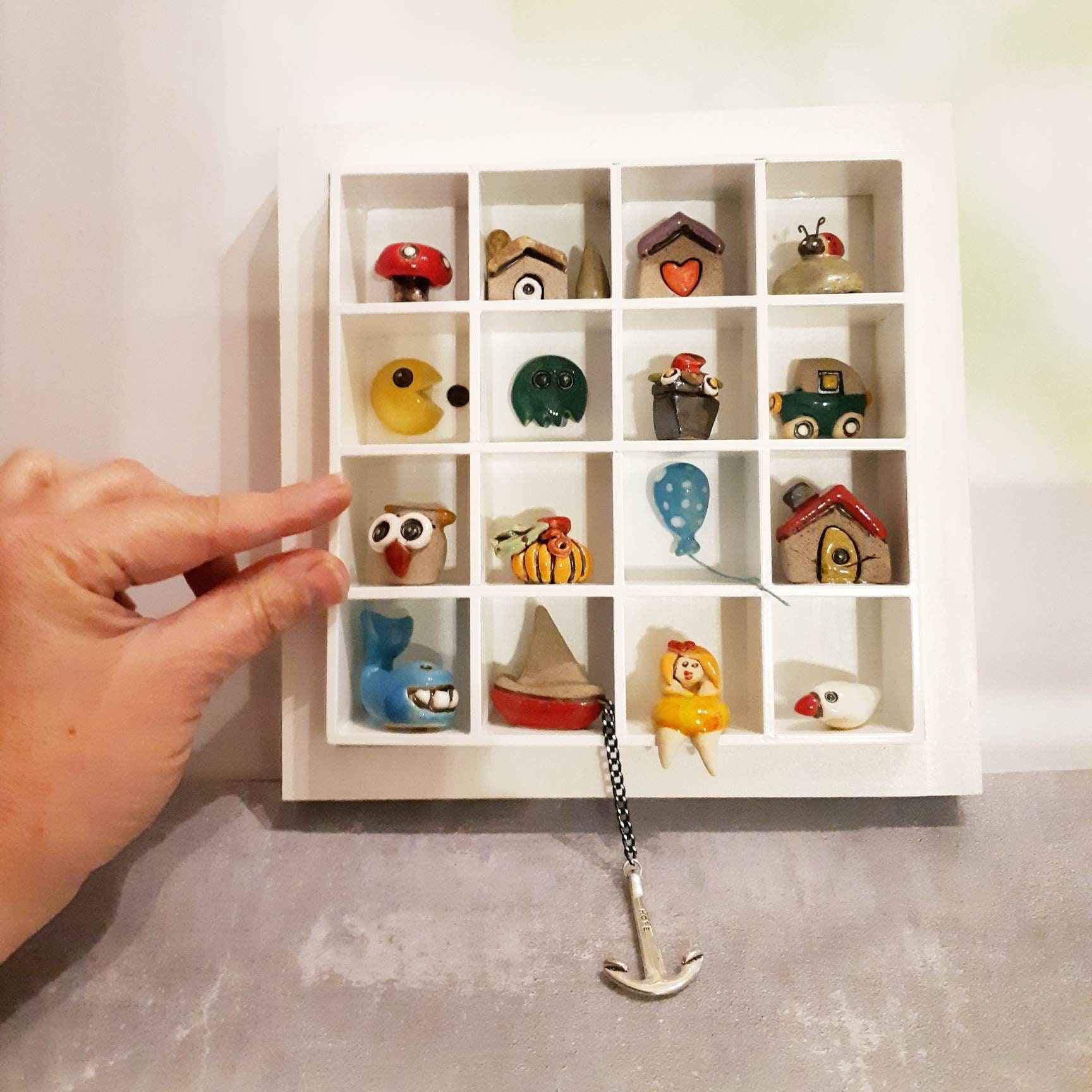 Wall decor picture of 16 miniatures in a small display rack | Etsy