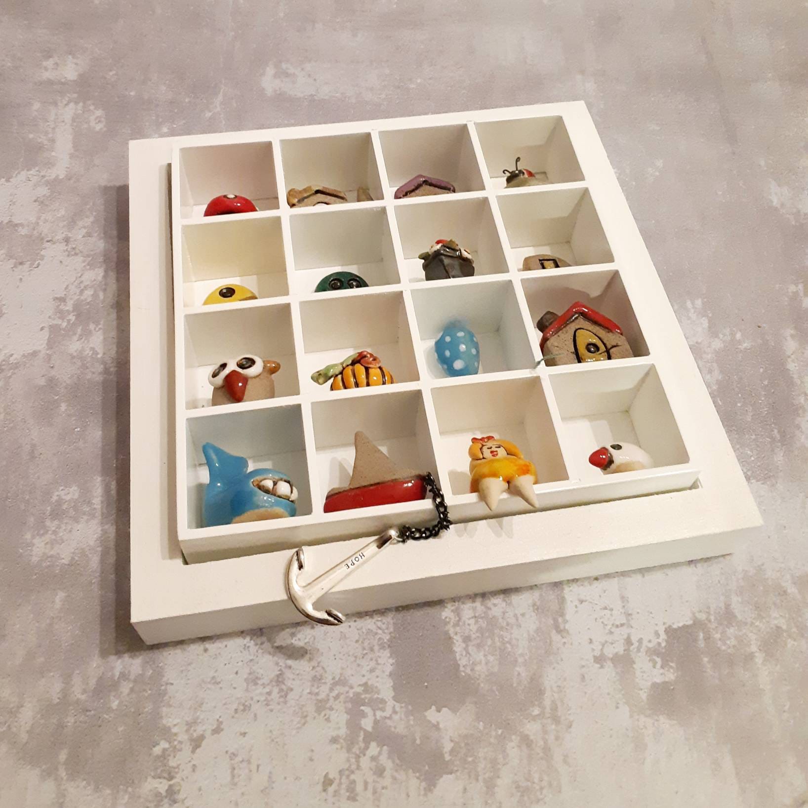 Wall decor picture of 16 miniatures in a small display rack | Etsy