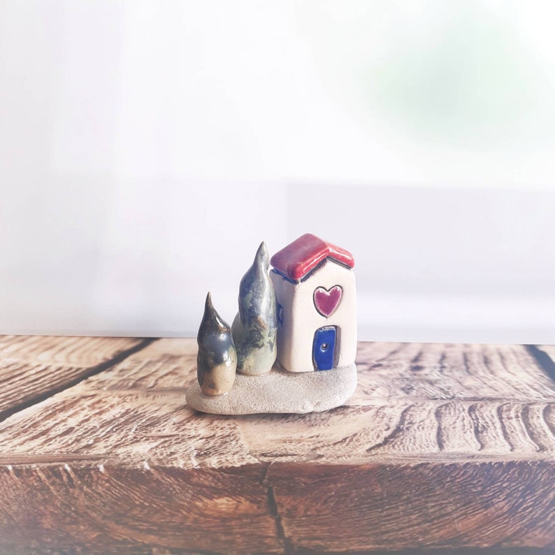 Small Ceramic House Sculpture With Two Little Trees on a Natural Beach ...