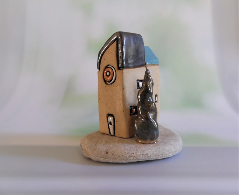 Ceramic Handmade Home Decor of a Clay House and a Tree on a Natural ...