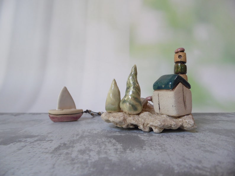 Ceramic Miniature of a Little Village, Including a Lighthouse, a Green ...