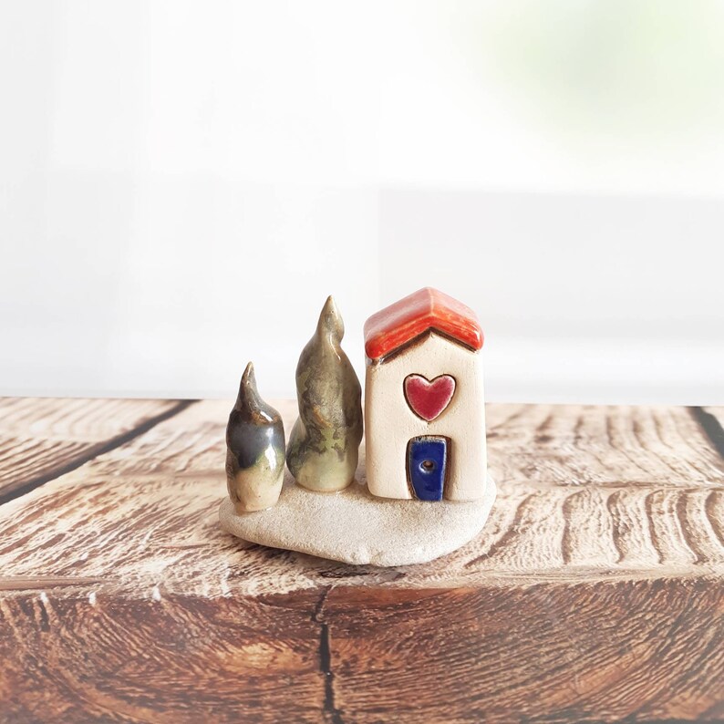 Small Ceramic House Sculpture With Two Little Trees on a Natural Beach ...