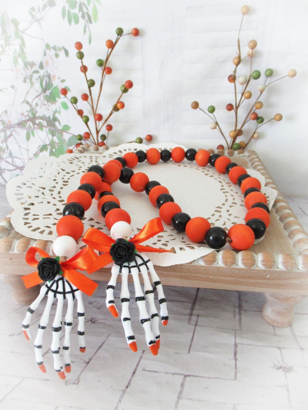 Skeleton Hand Halloween Garland: Orange & Black Wood Bead Tiered Tray ...