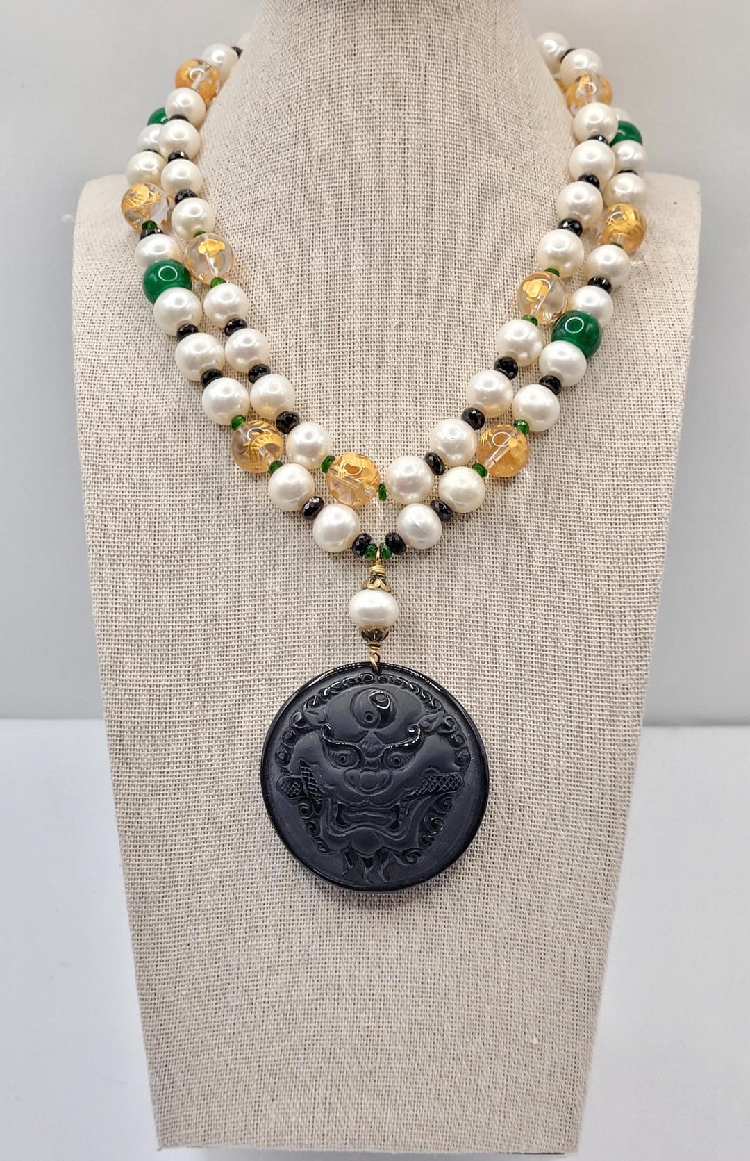 Giant Carved Dragon Face Basalt, Large Round White Freshwater Pearl ...