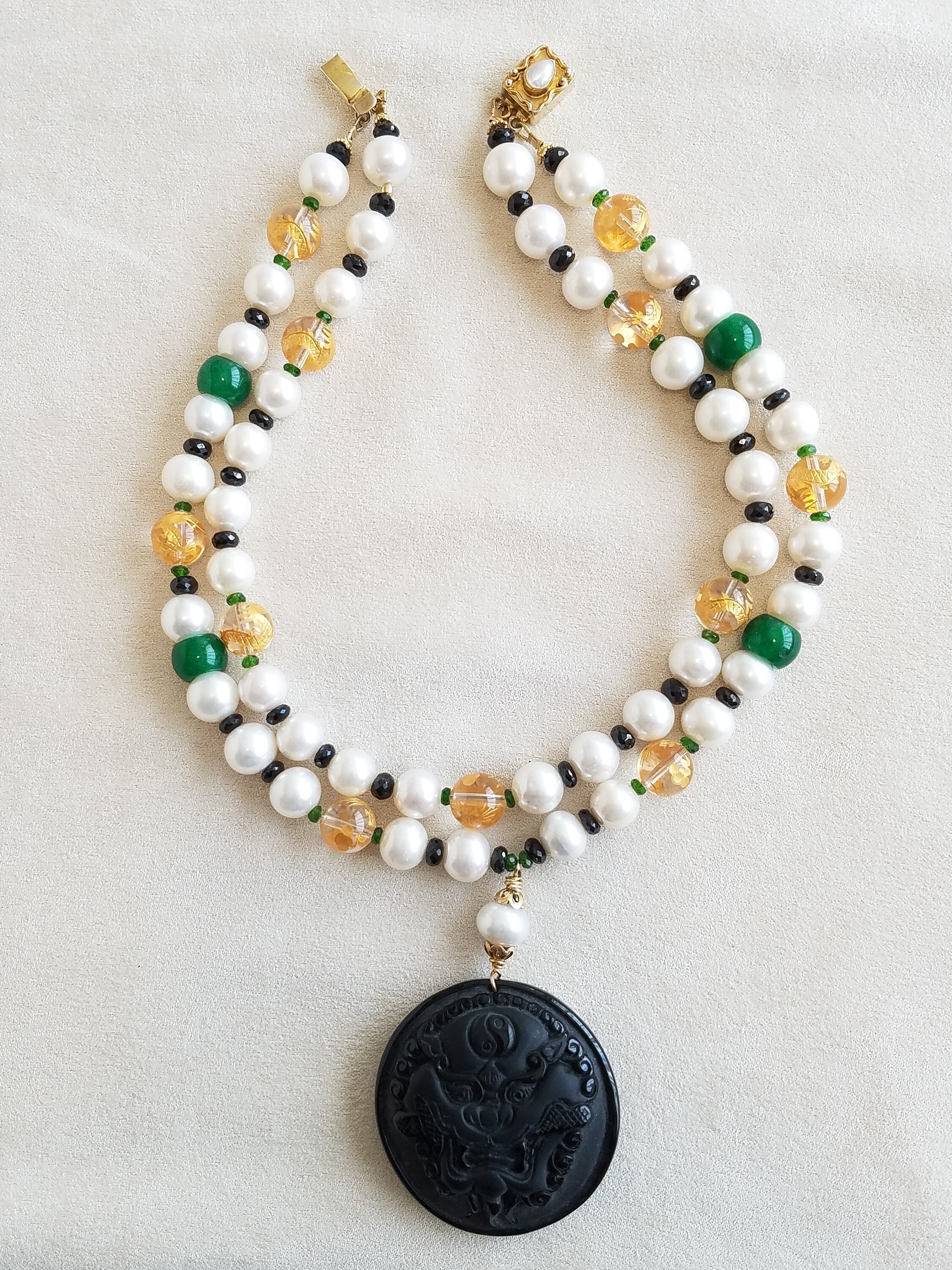 Giant Carved Dragon Face Basalt, Large Round White Freshwater Pearl ...