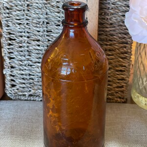 Vintage Brown and Clear Bottles Including Del-tox Bottle, Pennick ...