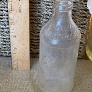 Vintage Brown and Clear Bottles Including Del-tox Bottle, Pennick ...