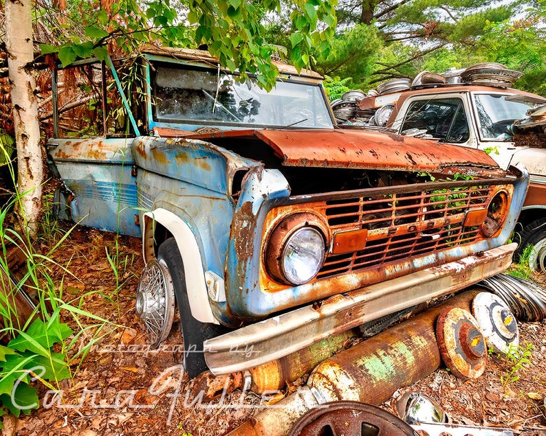 Photograph of a 1966 - 1975 Blue Ford First Generation Bronco in the ...