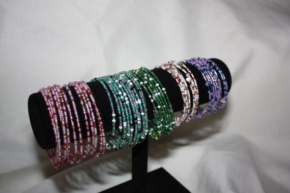 Items similar to Coil Bracelets on Etsy