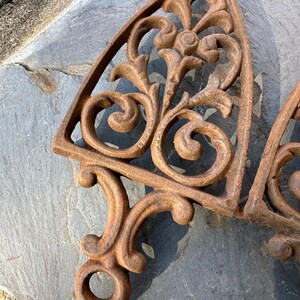 3 Antique Cast Iron Decorative Sad Iron Holders. Vintage Rusty Iron ...