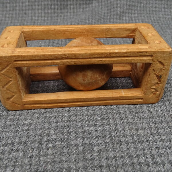 Ball in Cage - Etsy
