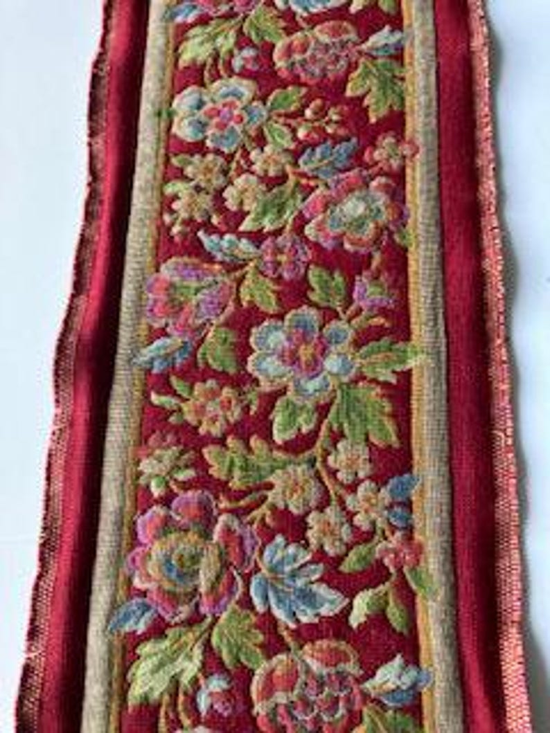 A Flora Tapestry Border Design in a Multi Tone on Burgundy Background ...