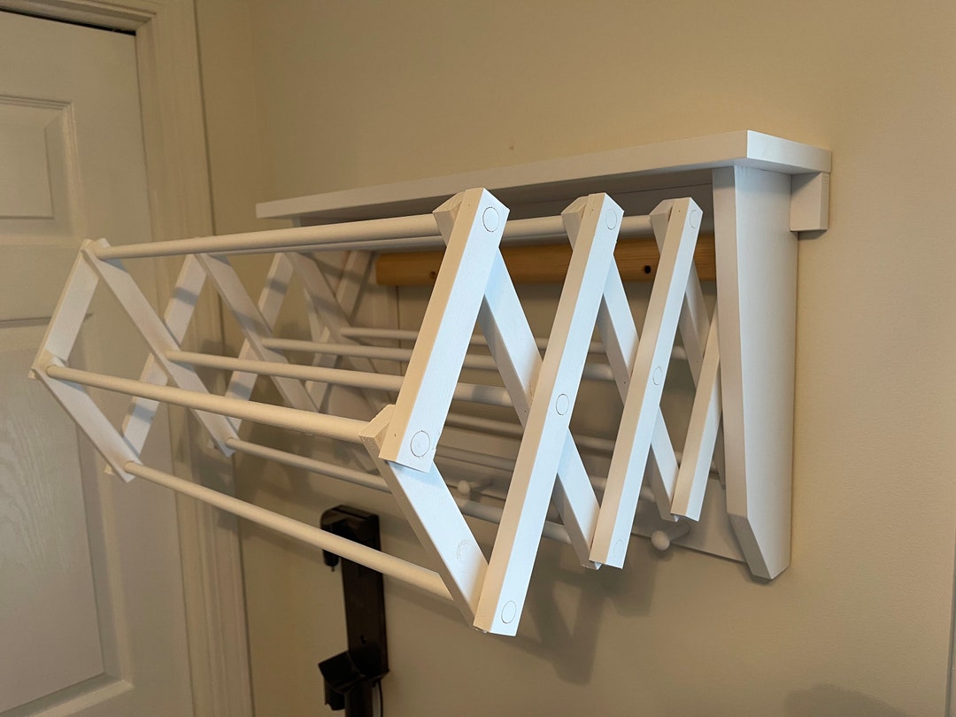 Modern Look White Wall Hanging Drying Rack shown on Unfinished Mount ...