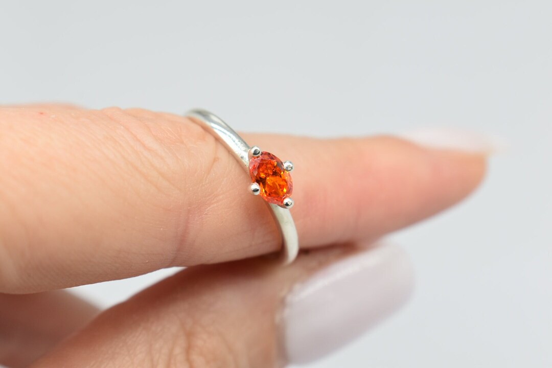 Radiant Citrus Blaze: A Stunning Orange Oval Diamond Ring - Stacking ...