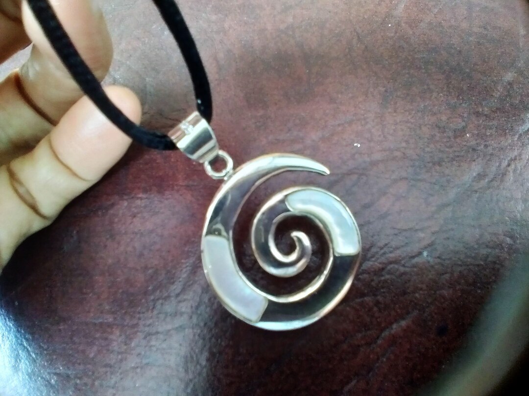 Conch Shell and Steel Spiral Koru Pendant . C4 - Etsy