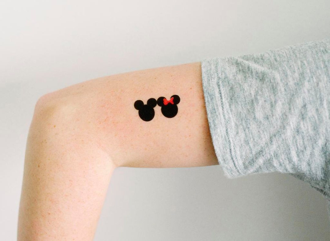 Mickey And Minnie Mouse Head Tattoos