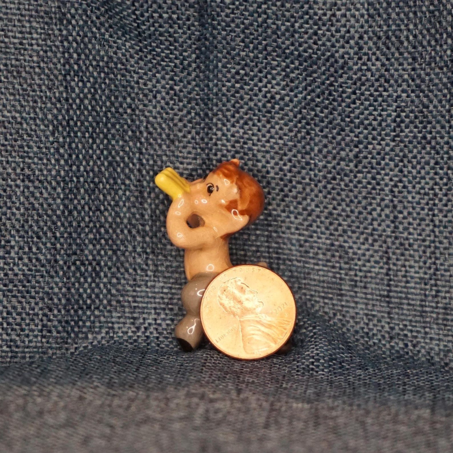 Hagen Renaker Disney Faun Figurine AS-IS. Miniature Fantasia Pan Seated ...