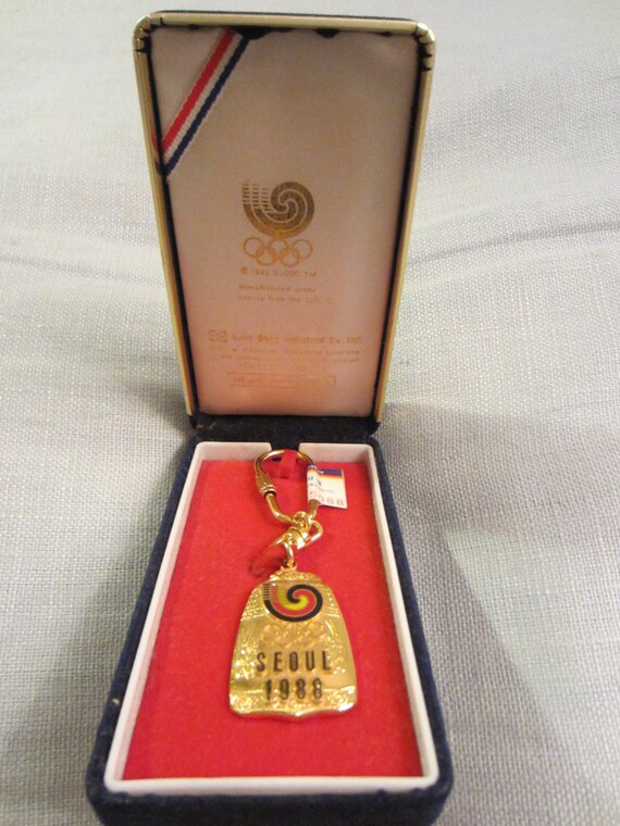 Golden Olympic Commemorative Enameling Key Ring - Gem