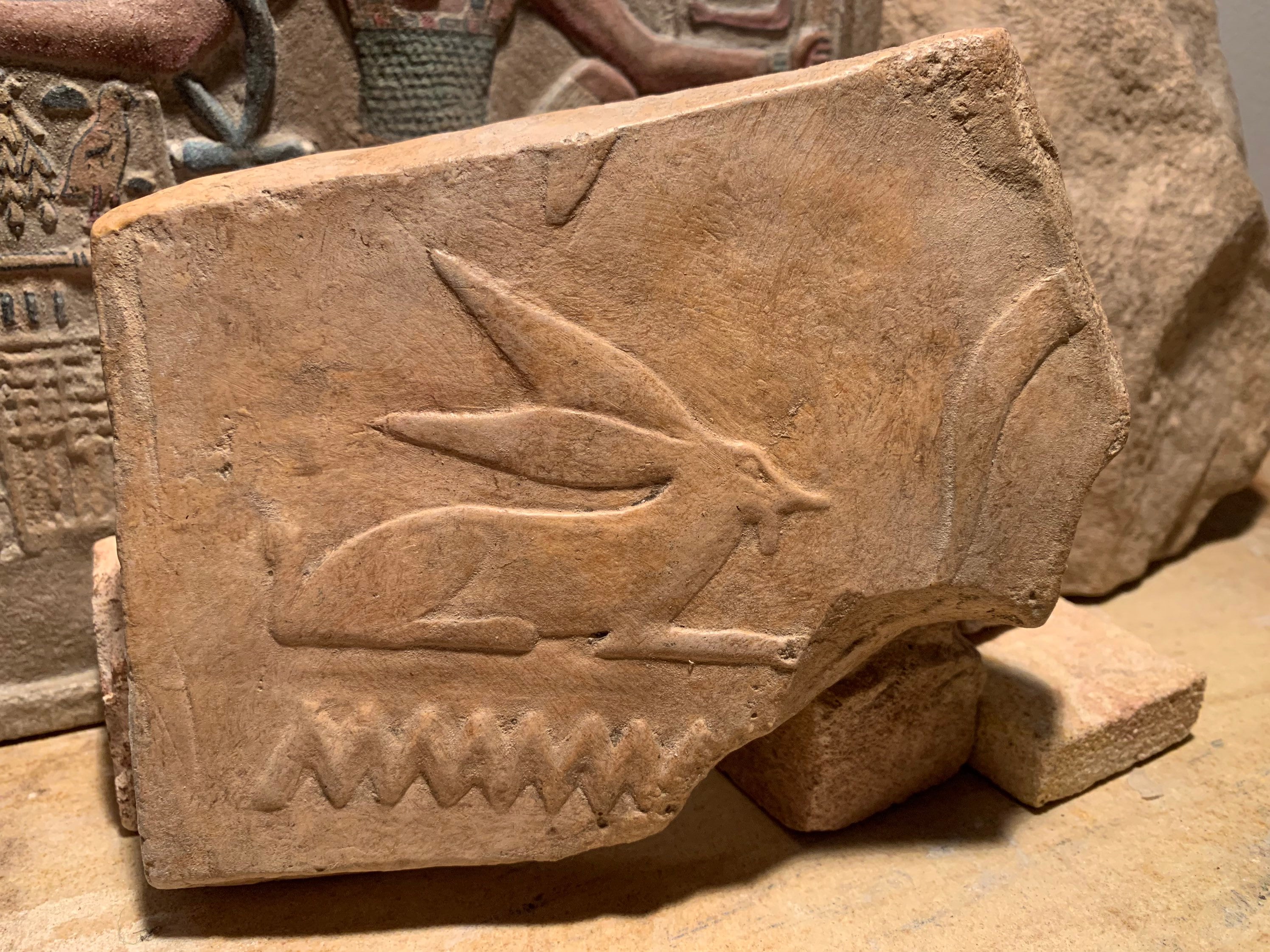 Egyptian Hieroglyphs - Desert hare and water symbol. Relief sculpture ...
