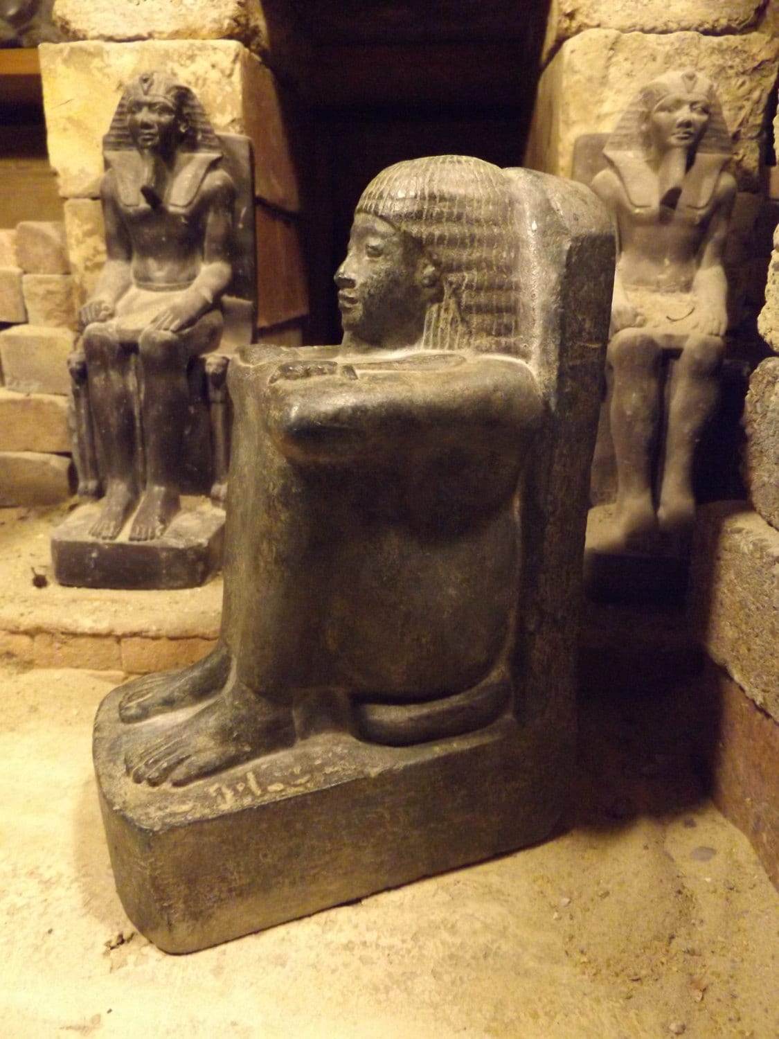 Egyptian block statue - museum replica sculpture. Reign of Horemheb