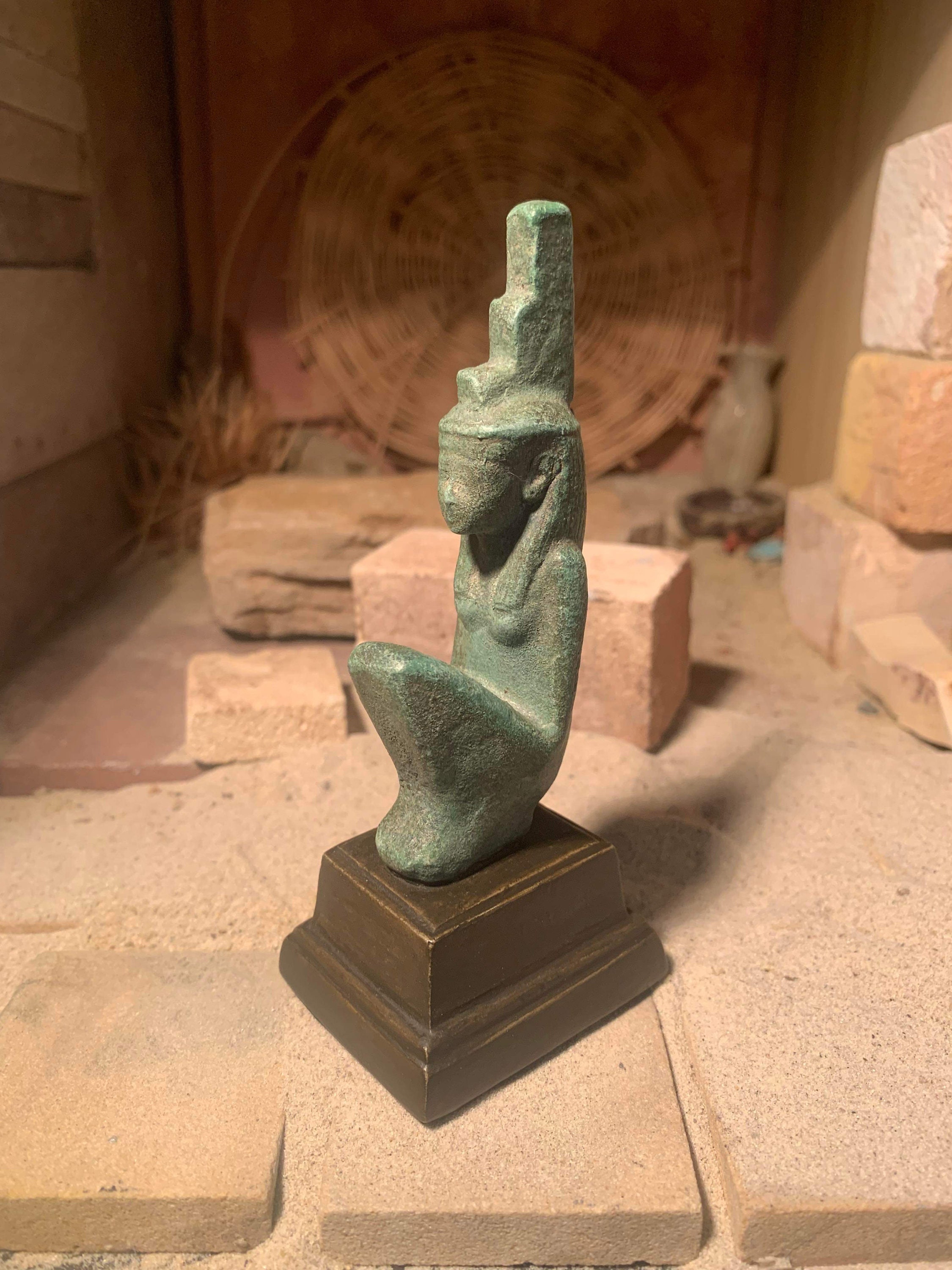 Isis - Egyptian statue replica. Seated Goddess of magic, motherhood ...