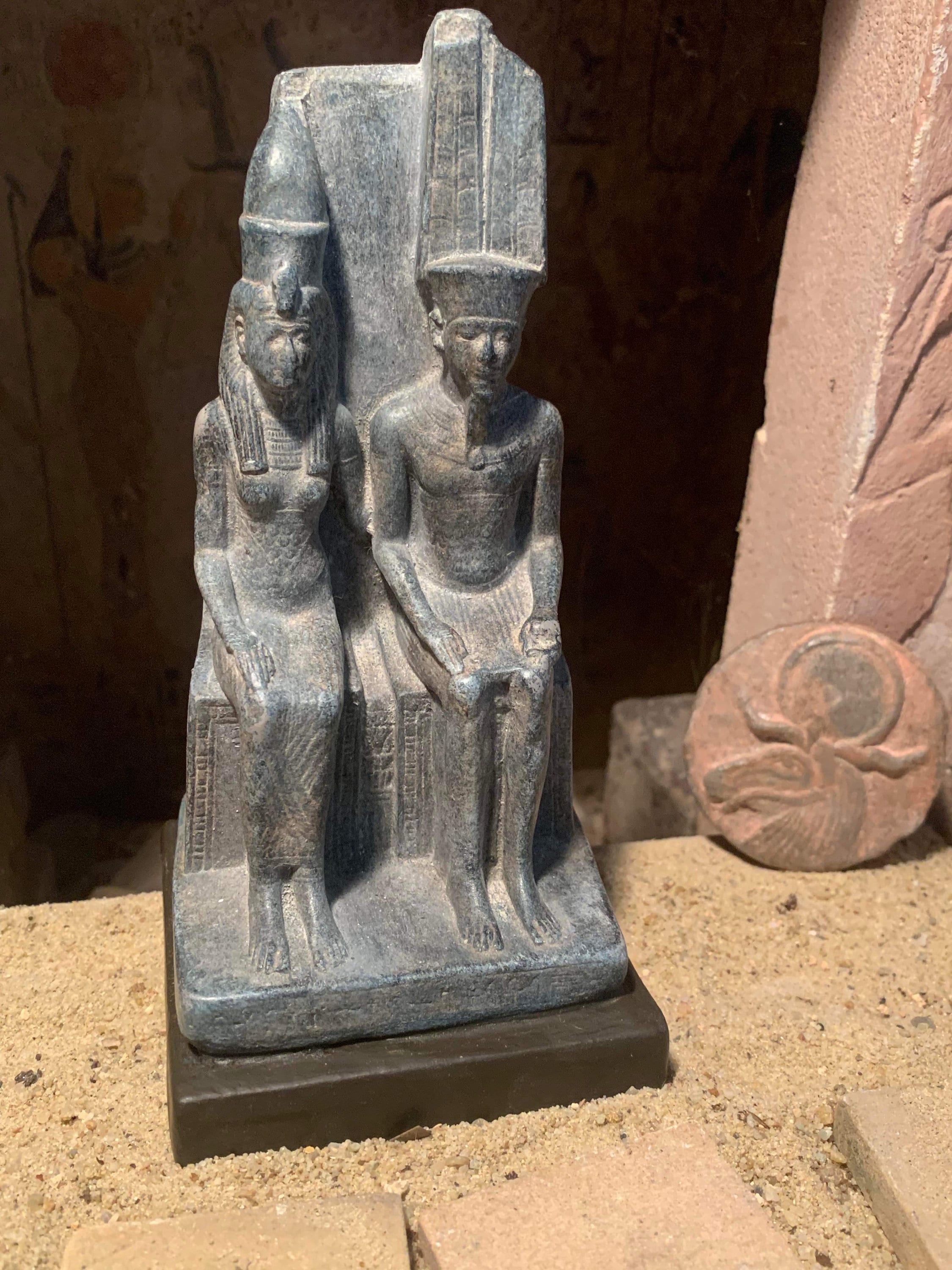 Egyptian museum statue replica of the God Amun & wife Mut. Ancient Egyptian mythology