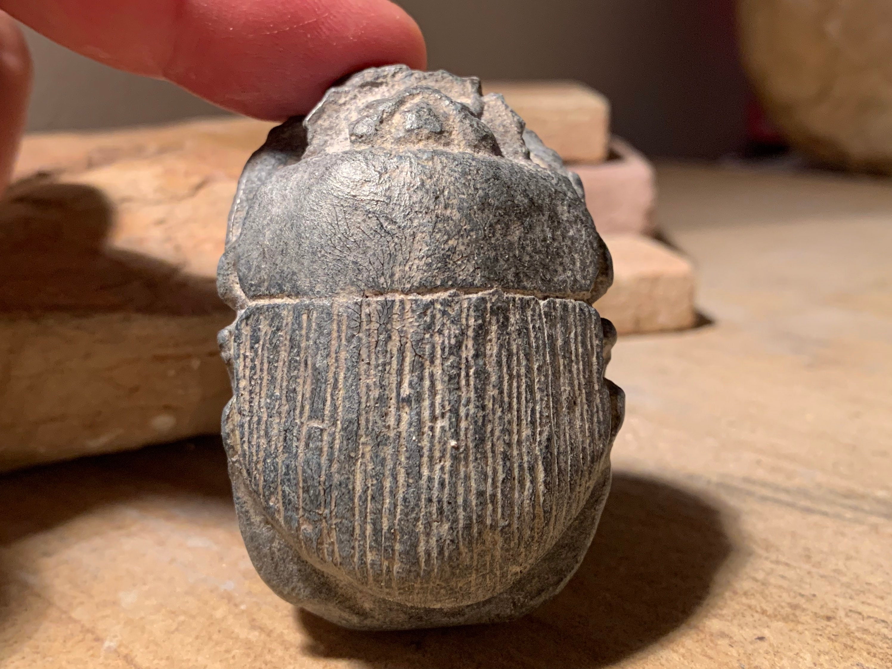 Egyptian art - King Tutankhamun scarab amulet featuring his name in hieroglyphs