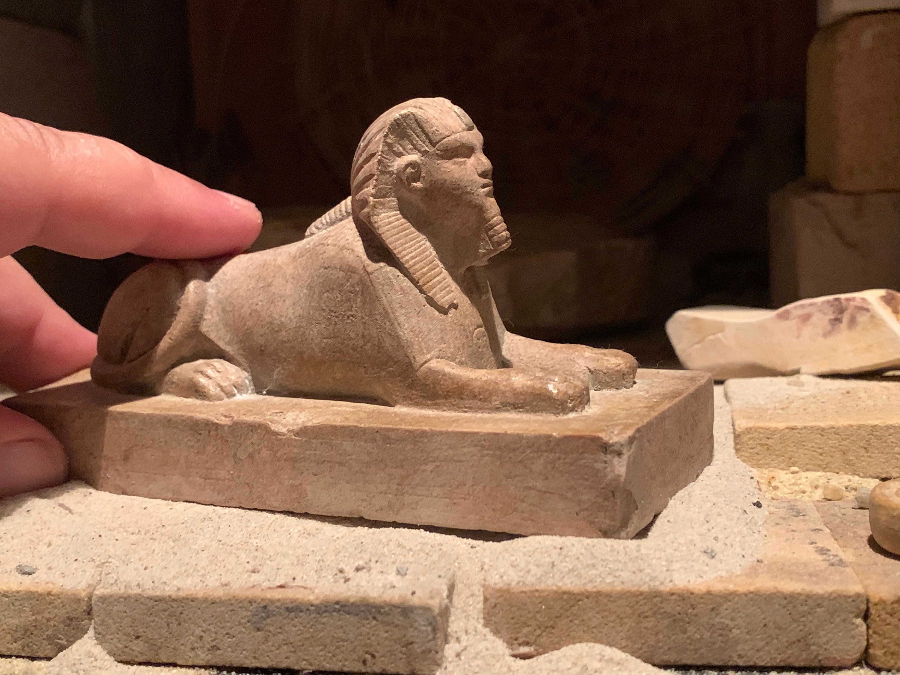 Egyptian Sphinx statue and amulet replica set. Egyptian sculpture and ...