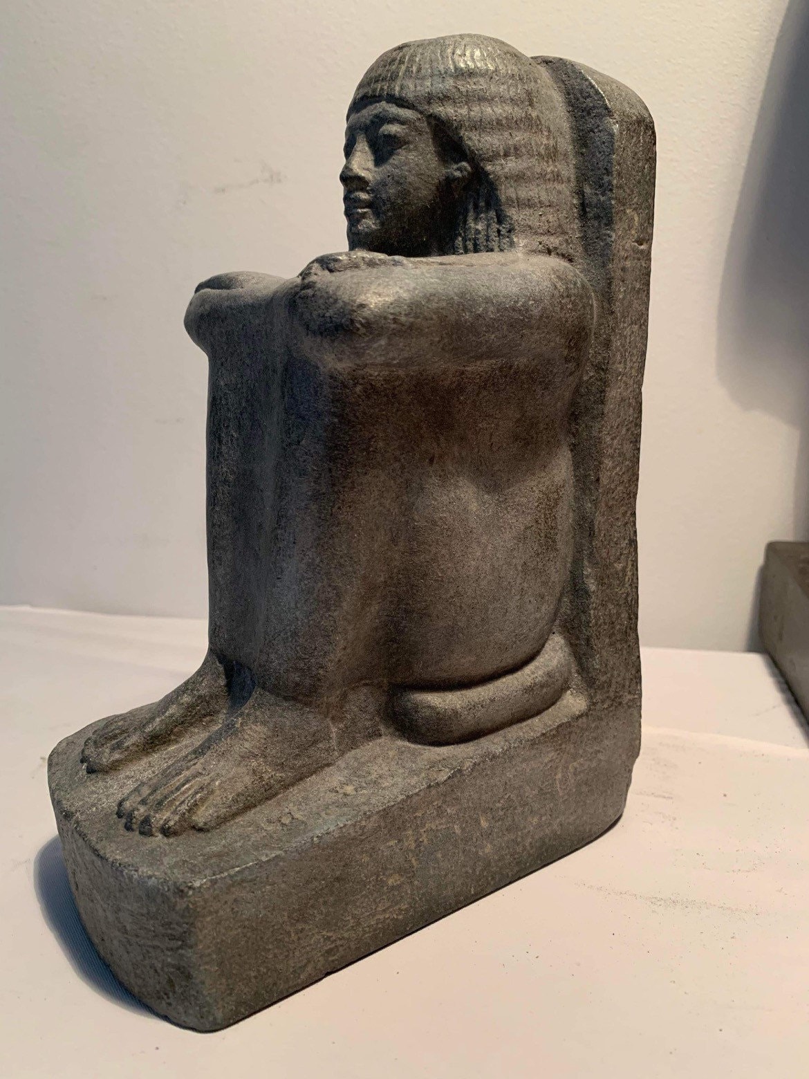 Egyptian block statue - museum replica sculpture. Reign of Horemheb