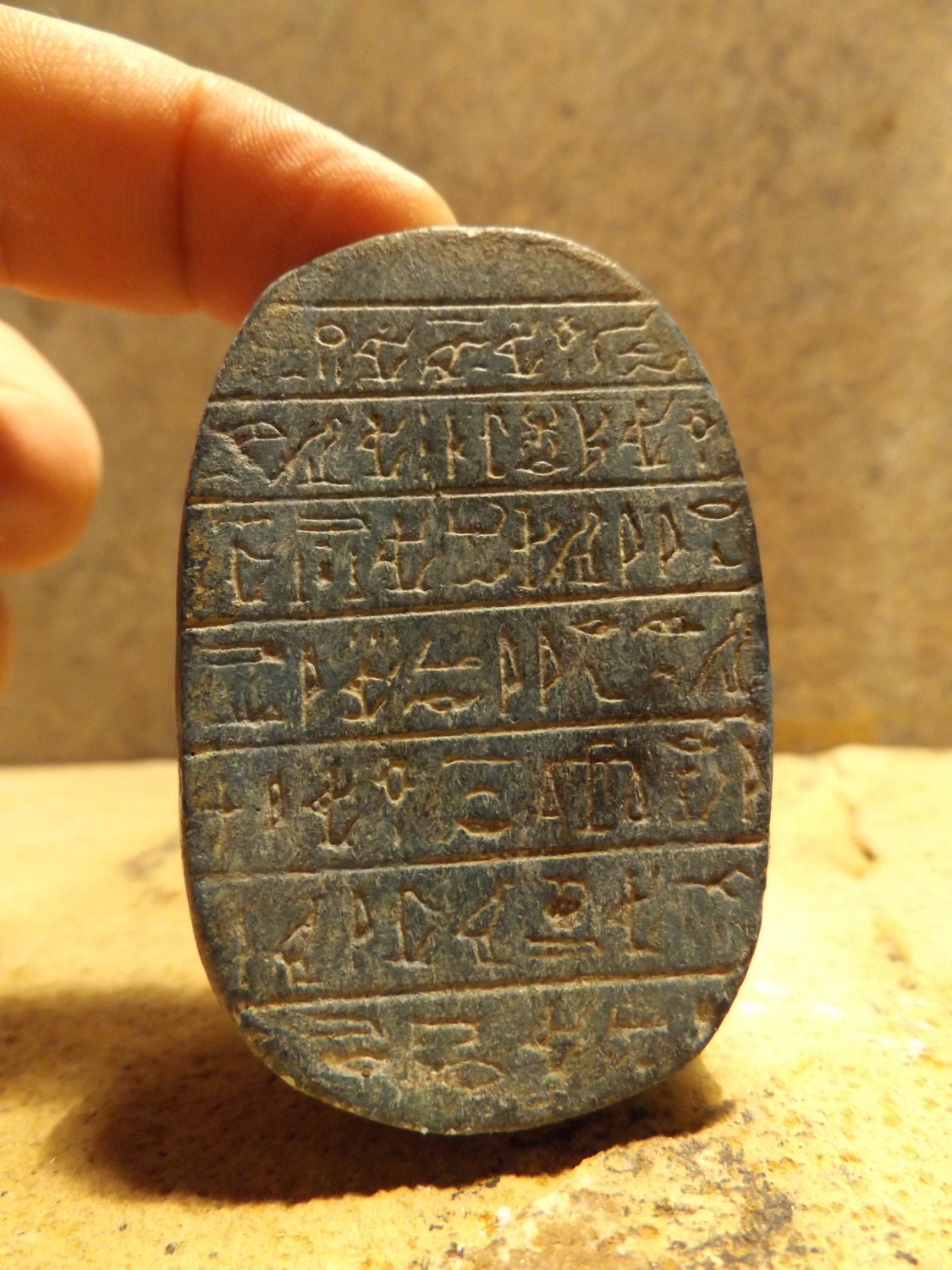 Egyptian art - New Kingdom scarab amulet replica. Hieroglyphic writing