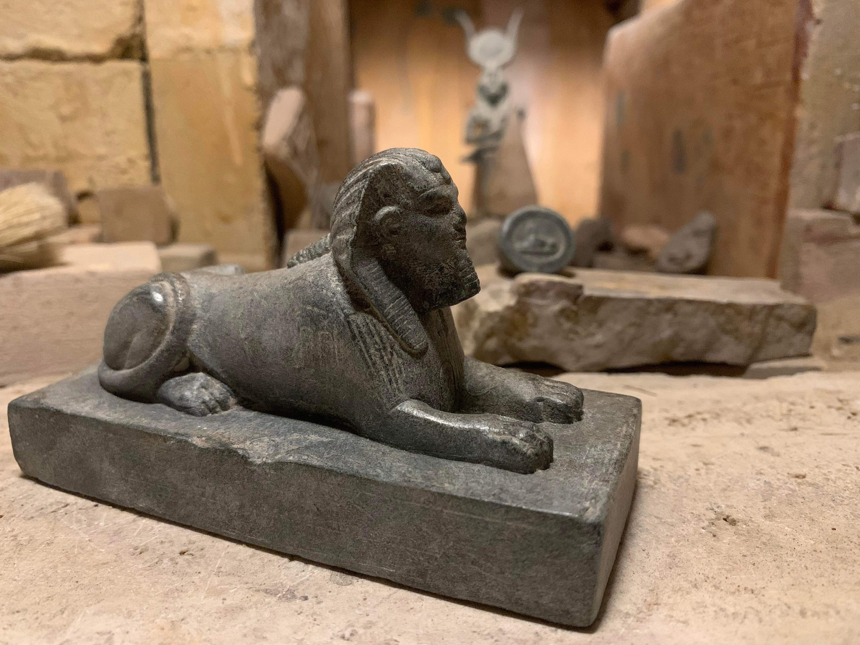 Egyptian Sphinx statue and amulet replica set. Egyptian sculpture and ...