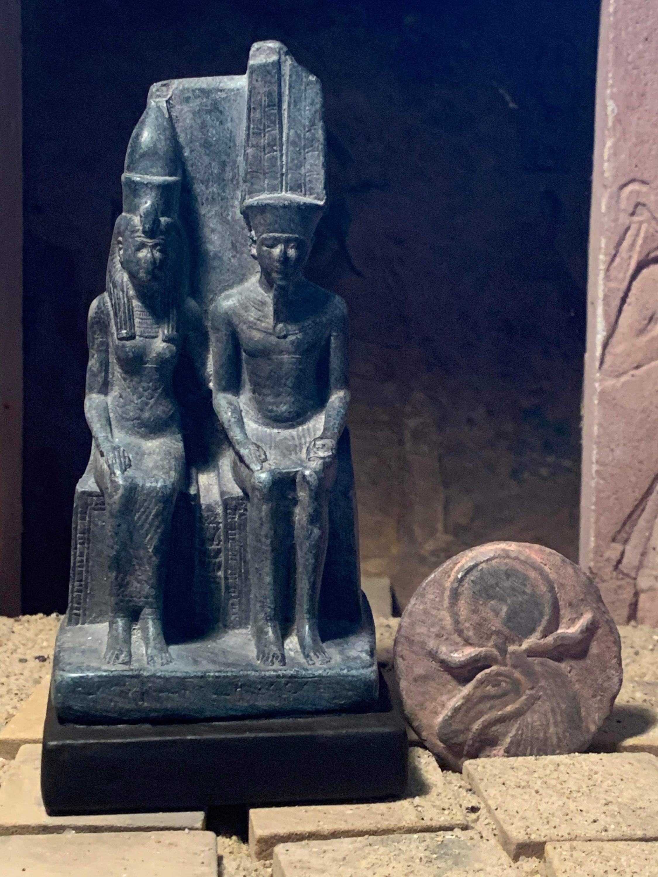 Egyptian museum statue replica of the God Amun & wife Mut. Ancient Egyptian mythology