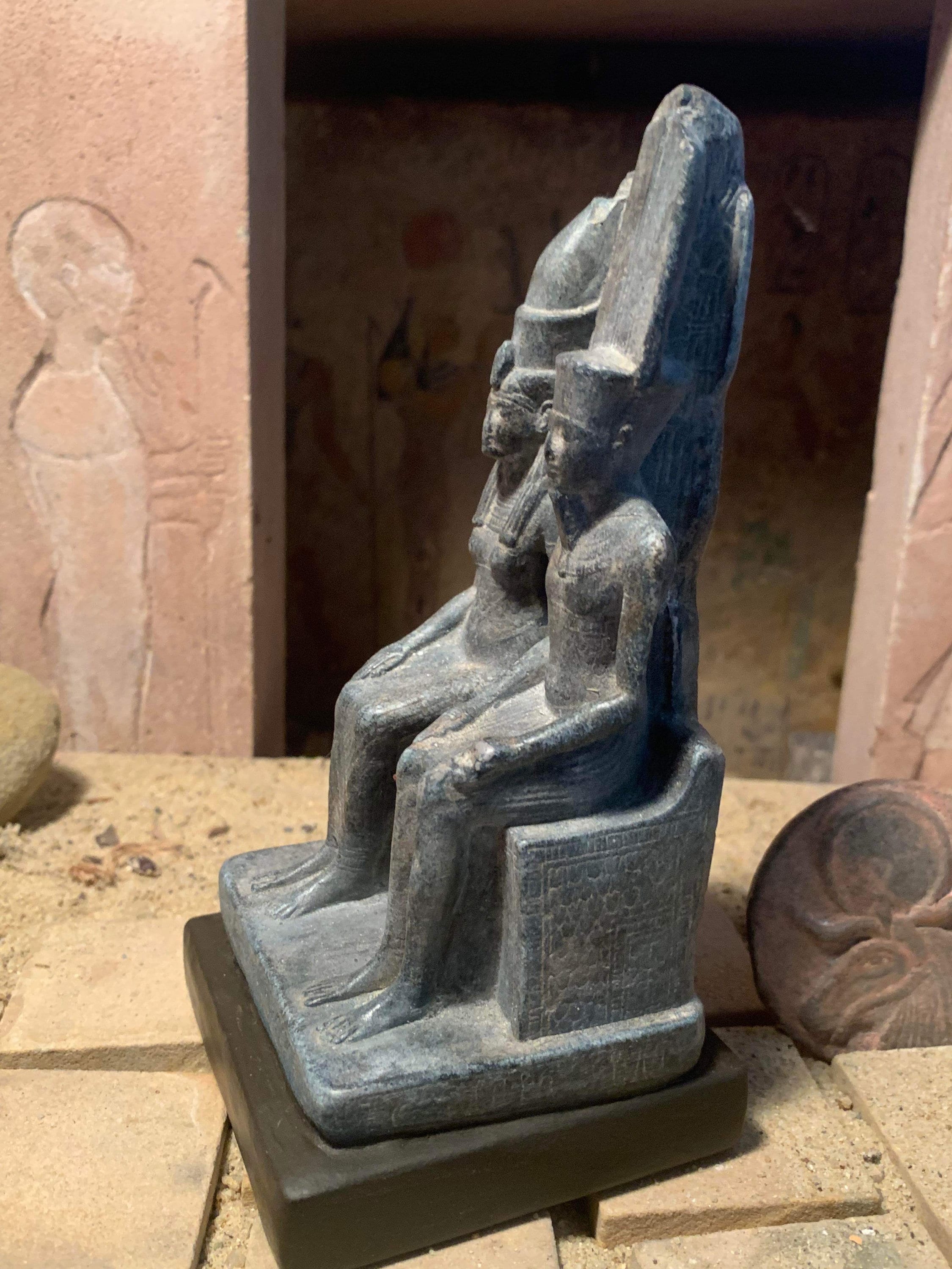 Egyptian museum statue replica of the God Amun & wife Mut. Ancient Egyptian mythology