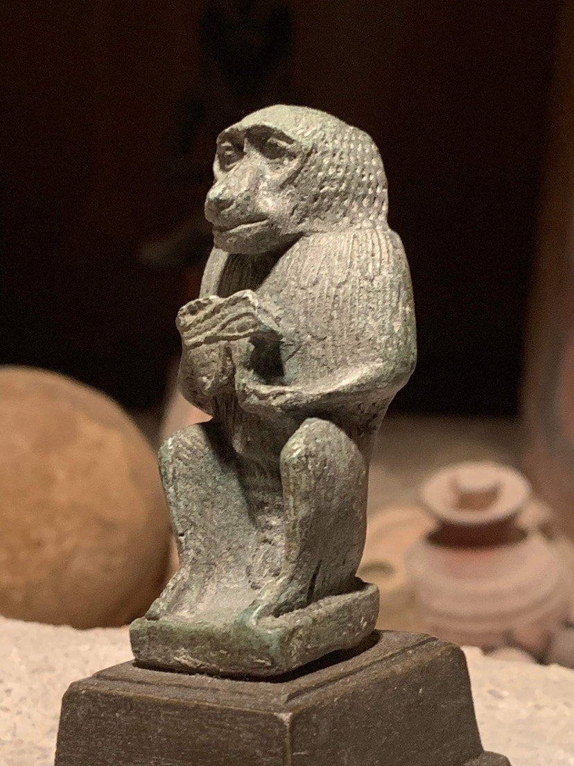 Egyptian statue of Thoth - God of writing, wisdom, records. Baboon form ...