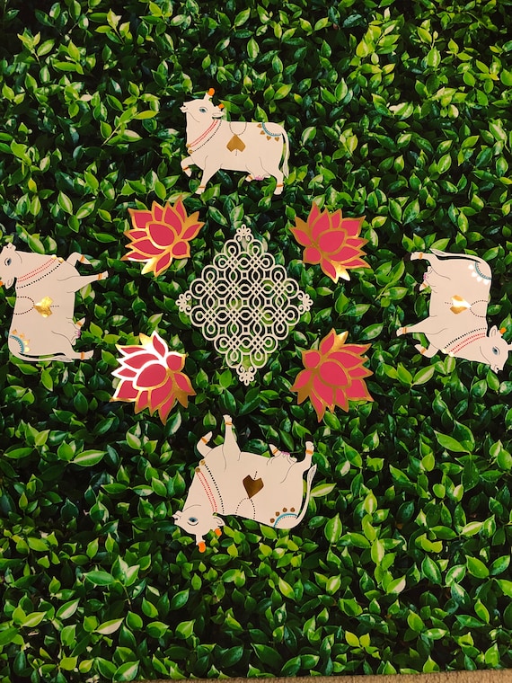 Lotus with Cow and kolam floor mat rangoli decoration by ...