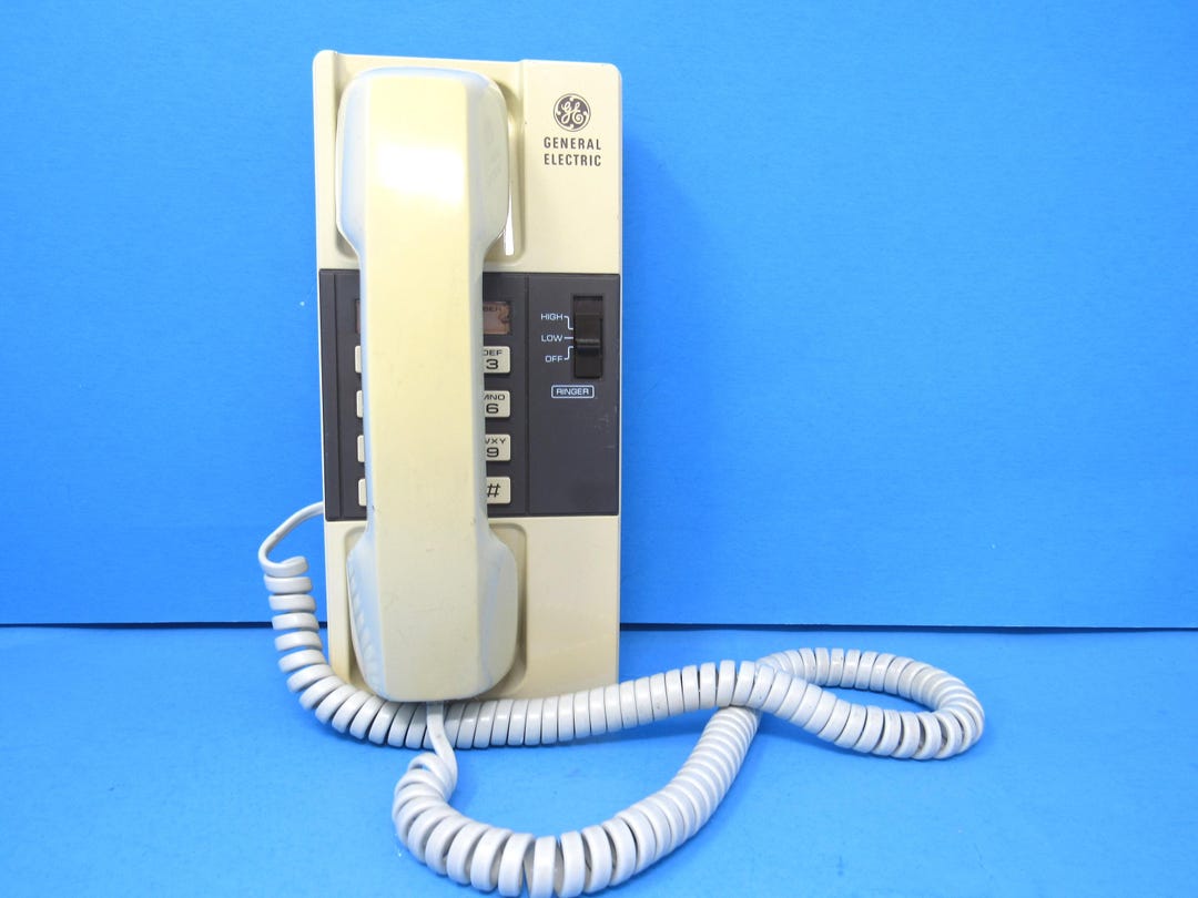 This is a Retro Push Button Phone With Curly Long Cord Made by General ...
