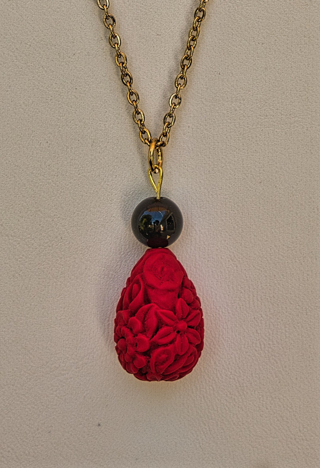 Carved Cinnabar Teardrop Pendant With Black Onyx, Gold Tone Cable Chain ...