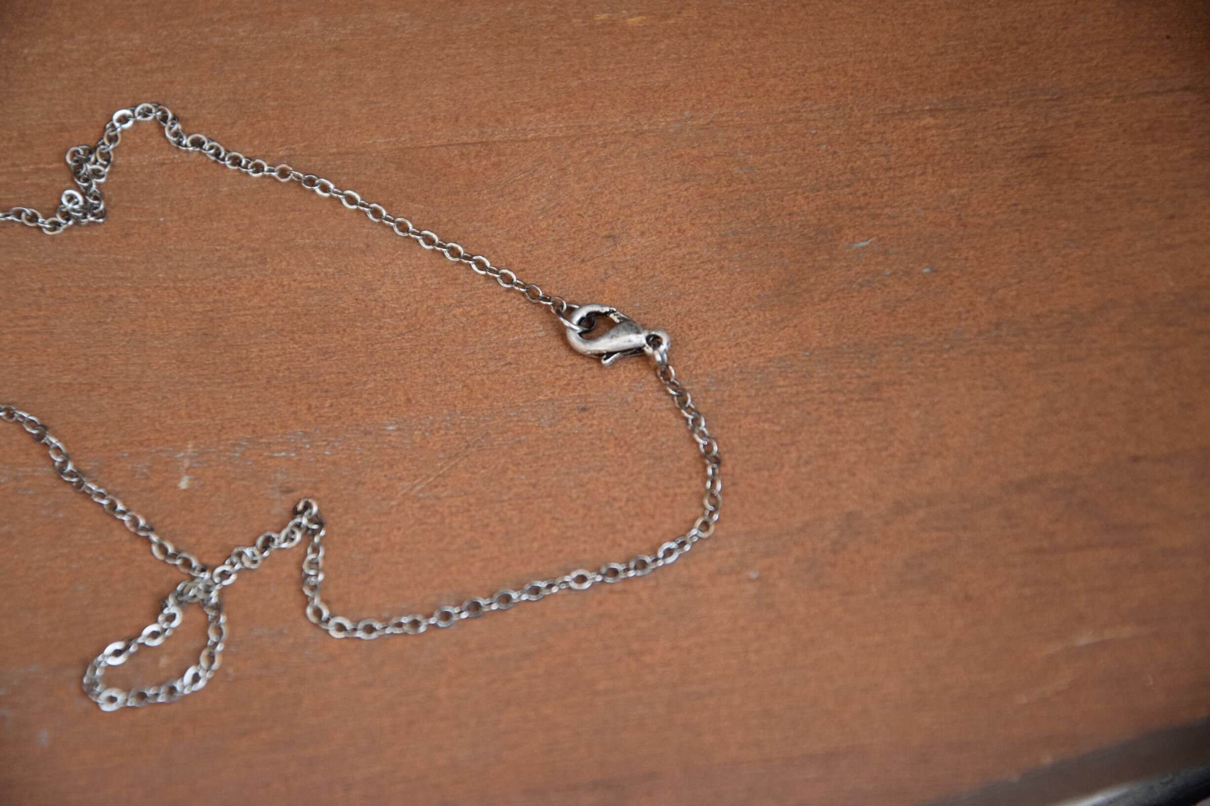 Troll Cross Pendant on a Rolo Chain