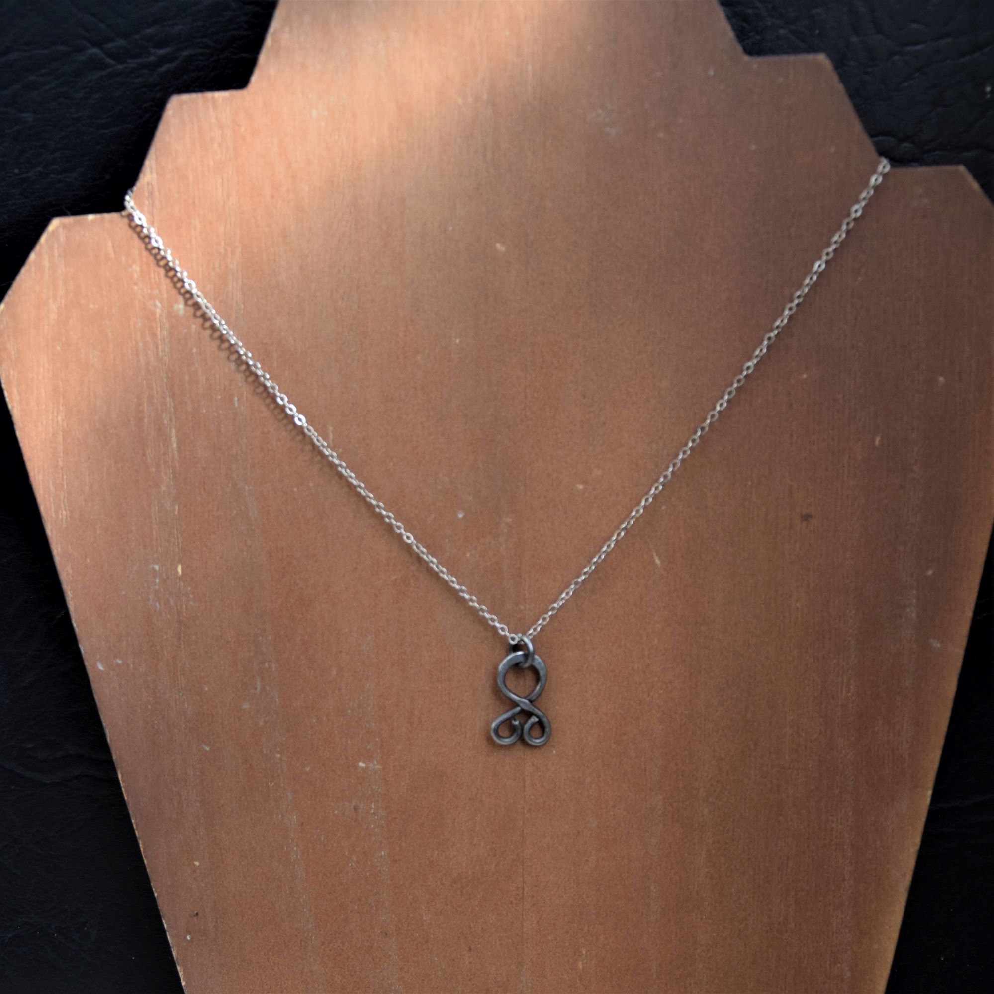 Troll Cross Pendant on a Rolo Chain