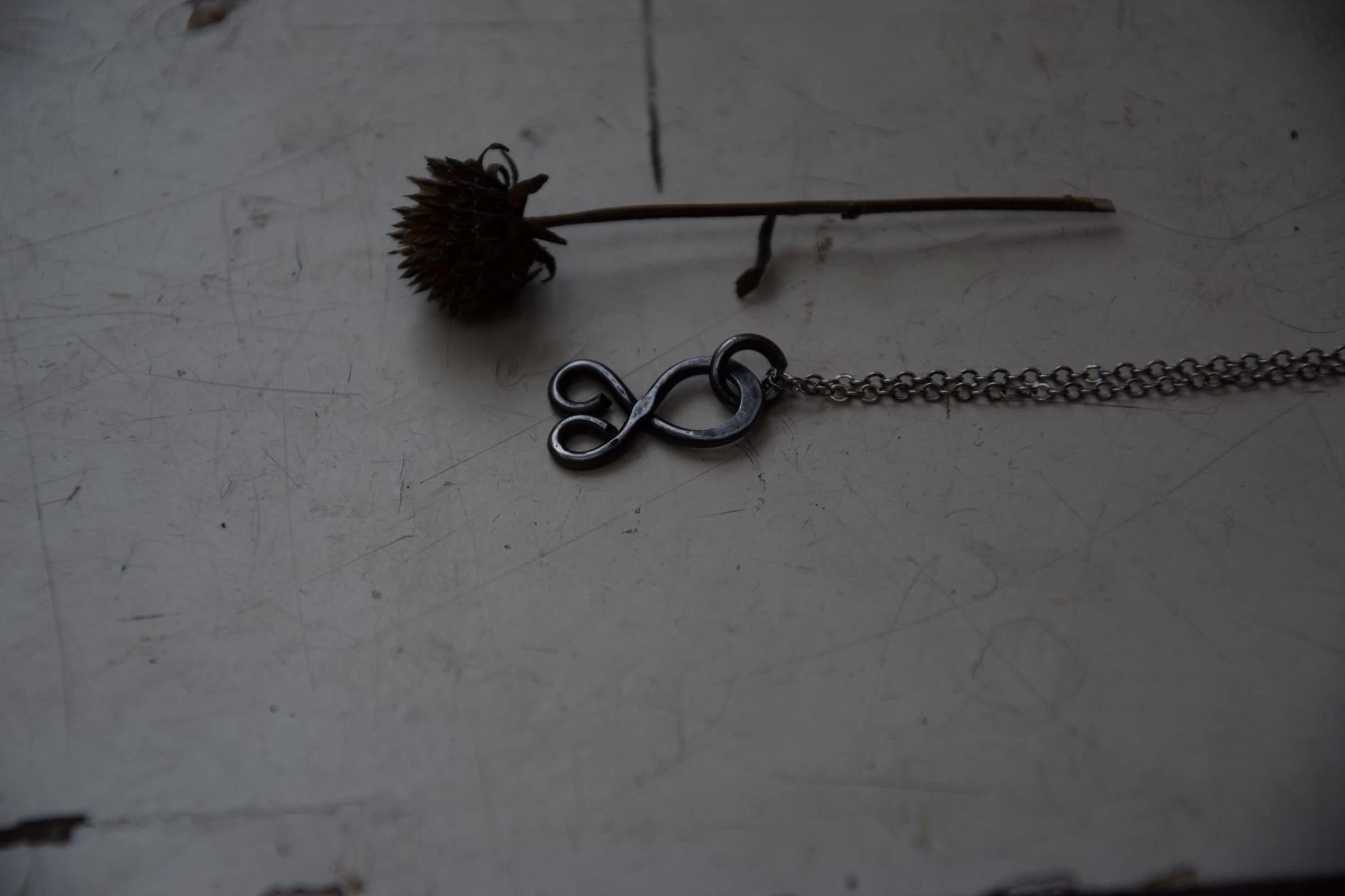 Troll Cross Pendant on a Rolo Chain