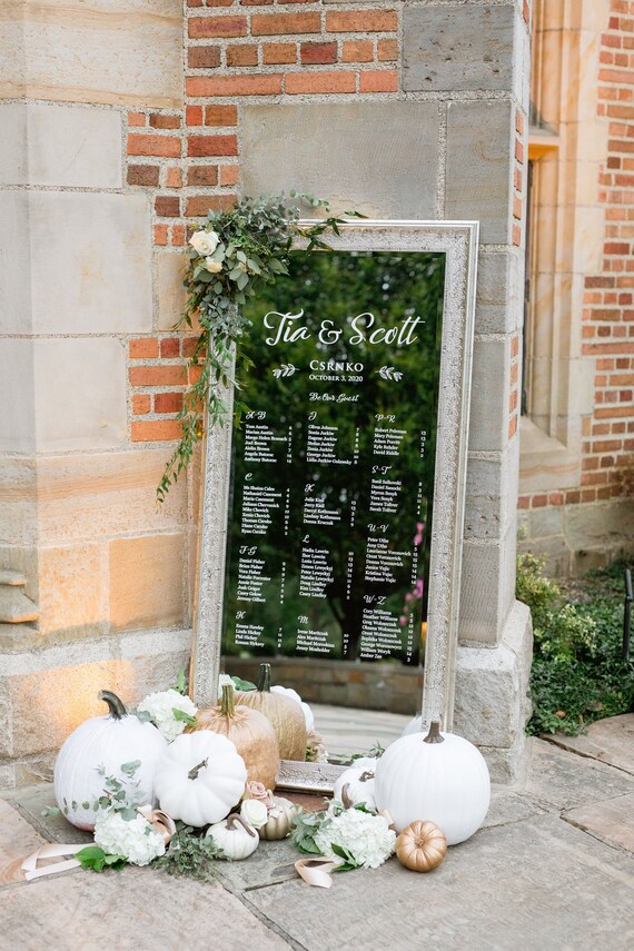 Large mirror for wedding table plan | Beachweddingtips.com