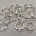 100 X 0.6mm Argentium Silver Open Jump Rings AWG 22 Saw Cut and Tumbled ...
