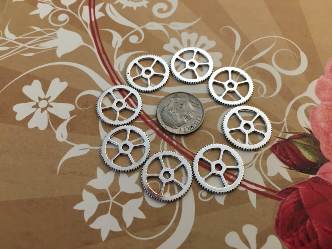Silver Steampunk Gears Cogs Buttons Pinwheel Spline Wobble Spinning ...