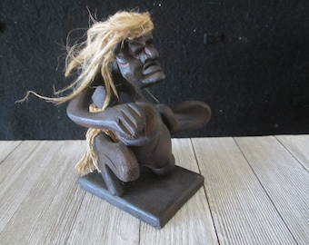 African Bongo Player - Etsy