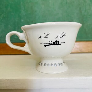 Baileys Cup With Winking Eye Curious Winking Lady Design - by Helen ...