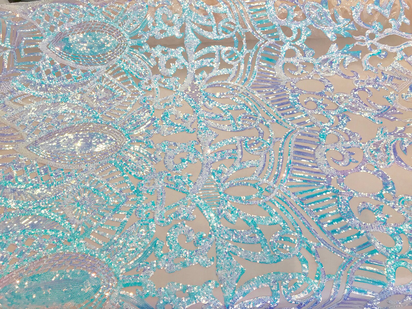 Aqua Royalty Iridescent Sequins on a 4 Way Stretch Nude Mesh Lace ...