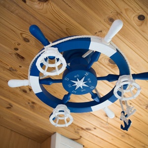 Wooden Ceiling Chandelier in the Children's Room in a Nautical Style as ...